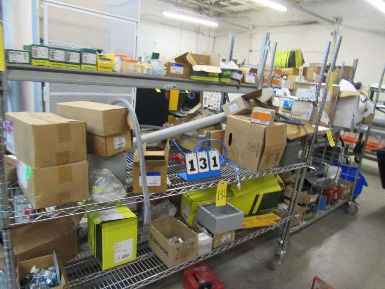 LOT (2) PORTABLE METRO RACKS, (2) METAL SHELVES, WITH ALL CONTENTS ON ...