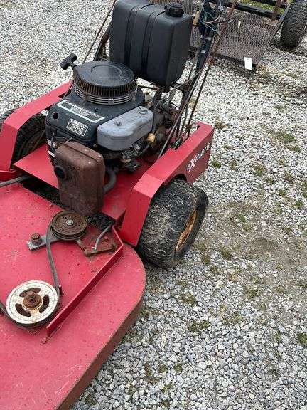 Exmark walk behind mower. - Schmid Auction