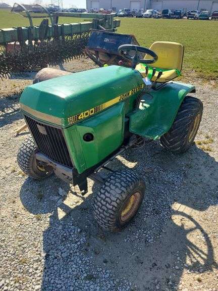 John Deere 400 lawn tractor, 870 hrs. no deck, needs battery, and ...
