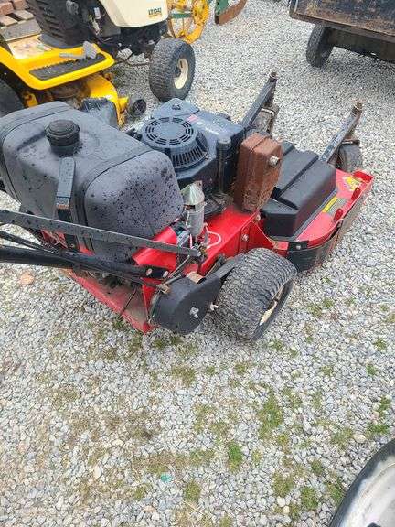 Snapper walk behind mower. - Schmid Auction