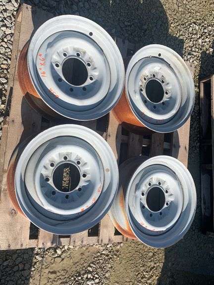 USA 4 16" New 8 bolt Trailer rims, - Schmid Auction