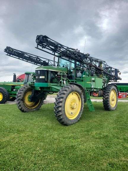 John Deere 4710 sprayer, 90' booms on 20", 3865 hrs. John Deere 300 globe with brown box, 420/80 ...