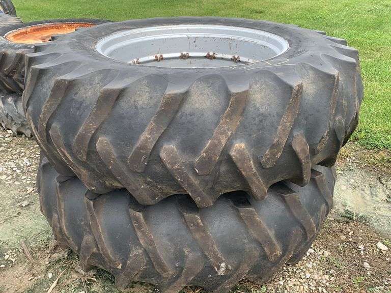 Pair 20.8-38 Tractor tires on IH rims, will fit others. - Schmid Auction