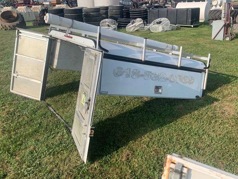 Camper shell w/toolbox and ladder racks - Schmid Auction
