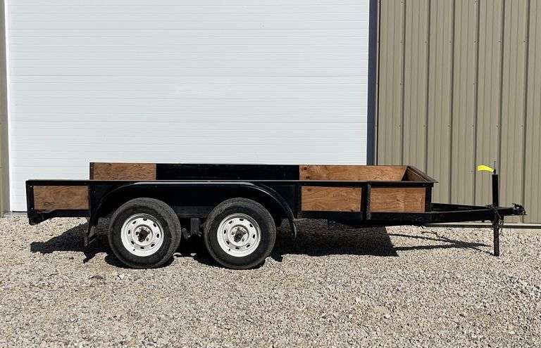 1988 5'3"x12' flatbed utility trailer - Schneider Auctioneers LLC