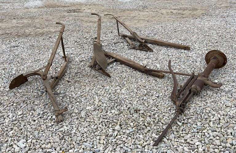 Group of antique horse drawn farm implements - Schneider Auctioneers LLC