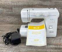 Baby Lock BL9 sewing machine - Schneider Auctioneers LLC
