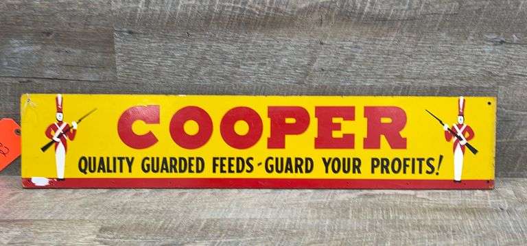 Cooper Feeds sign on fiberboard - Schneider Auctioneers LLC