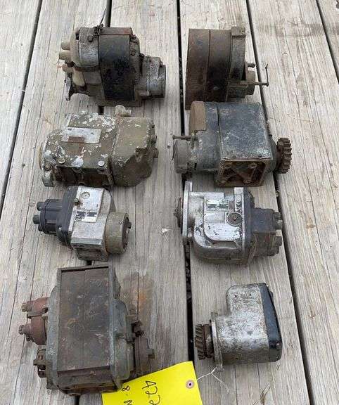 8 antique engine magnetos - Schneider Auctioneers LLC
