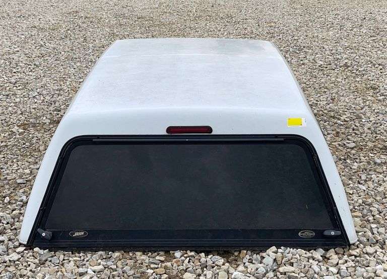 Jason 8' fiberglass camper shell - Schneider Auctioneers LLC