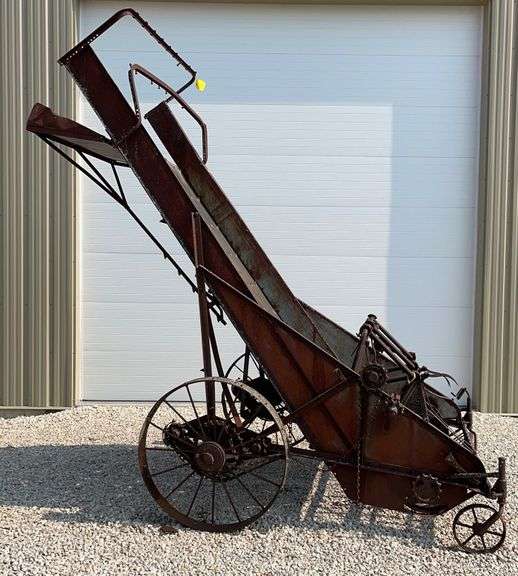 Antique International horse drawn hay loader - Schneider Auctioneers LLC
