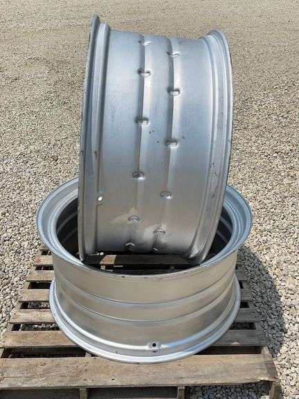 Pair of Unverferth 18"x38" tractor rims - Schneider Auctioneers LLC