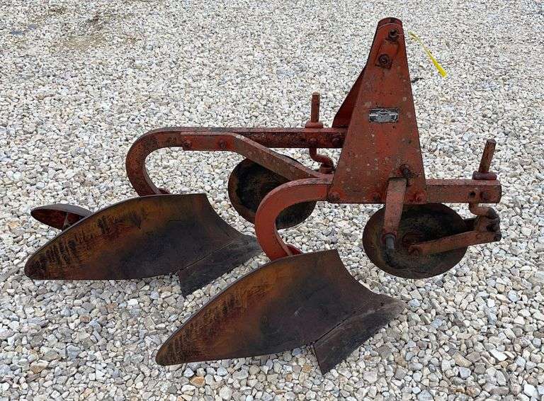 Dearborn 2-14” plow with coulters - Schneider Auctioneers LLC