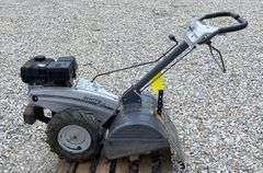 White by MTD rear tine tiller - Schneider Auctioneers LLC