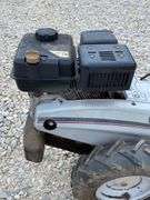 White by MTD rear tine tiller - Schneider Auctioneers LLC