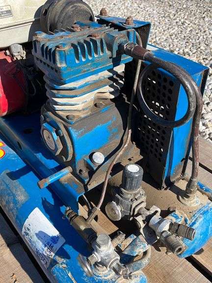 Emglo gas powered portable air compressor - Schneider Auctioneers LLC