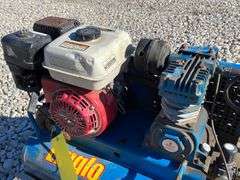 Emglo gas powered portable air compressor - Schneider Auctioneers LLC