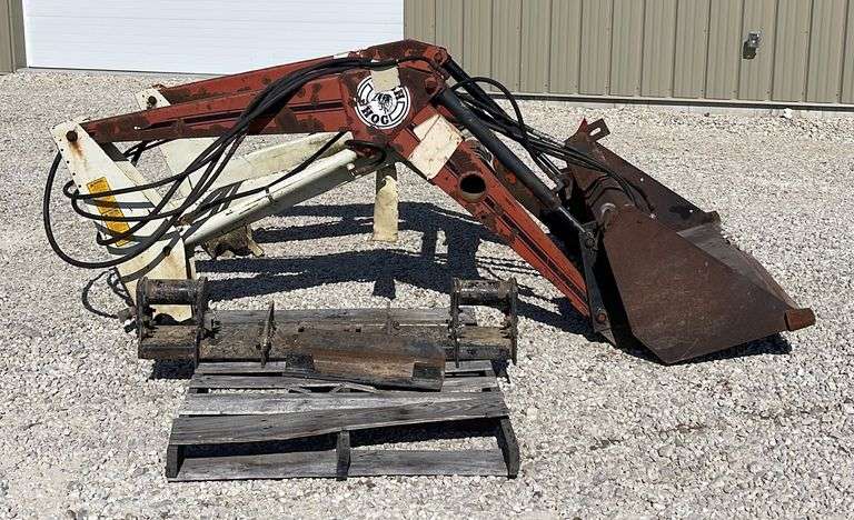 Bush Hog loader on Farmhand frame - Schneider Auctioneers LLC