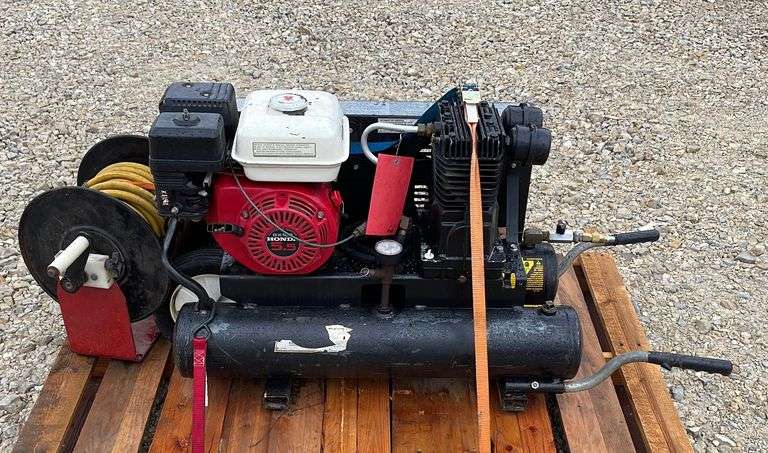 Gas powered portable air compressor - Schneider Auctioneers LLC
