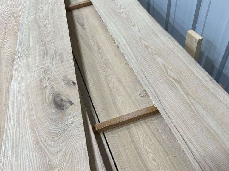 Group of rough sawn ash lumber - Schneider Auctioneers LLC