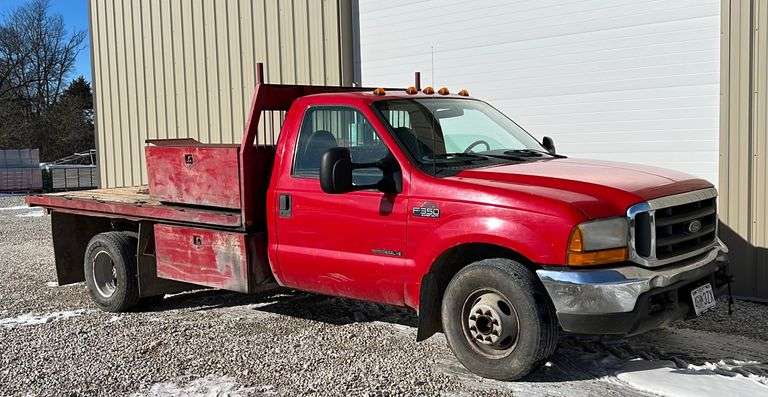 2000 Ford F350 flatbed - Schneider Auctioneers LLC