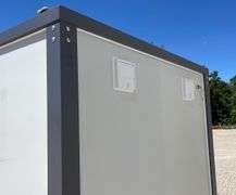 Unused Uppro portable double toilet unit - Schneider Auctioneers LLC