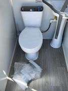 Unused Uppro portable double toilet unit - Schneider Auctioneers LLC