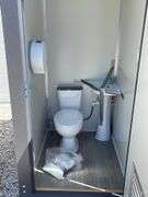 Unused Uppro portable double toilet unit - Schneider Auctioneers LLC
