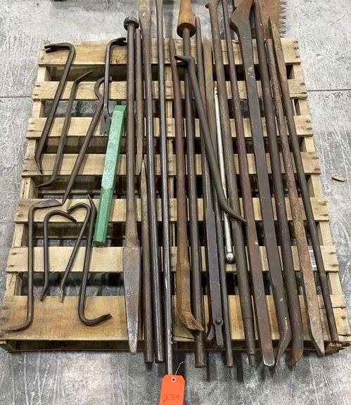 Large group of iron pry bars - Schneider Auctioneers LLC