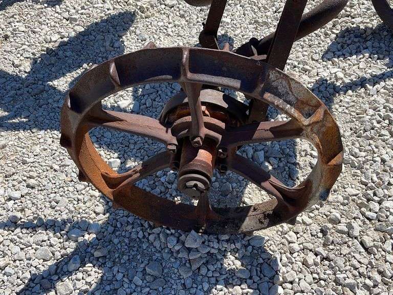 Antique John Deere 2-bottom disc plow - Schneider Auctioneers LLC