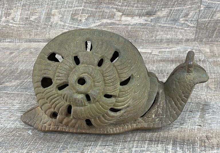 Cast iron snail for decor - Schneider Auctioneers LLC