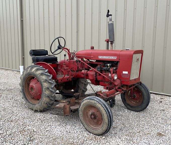 International 140 tractor w/ belly mower - Schneider Auctioneers LLC