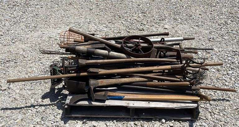 Group of long handled tools - Schneider Auctioneers LLC