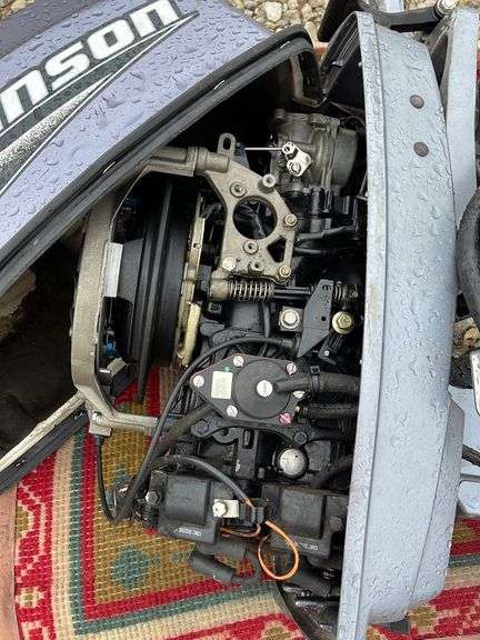 2000 Johnson 25 hp outboard motor - Schneider Auctioneers LLC