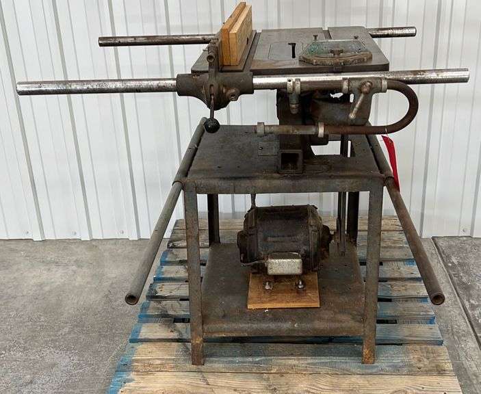 Delta table saw - Schneider Auctioneers LLC