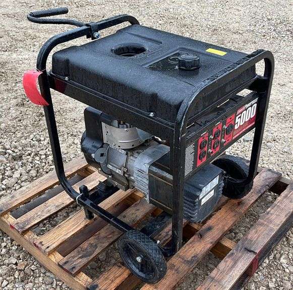 Coleman Powermate 5000 watt generator - Schneider Auctioneers LLC