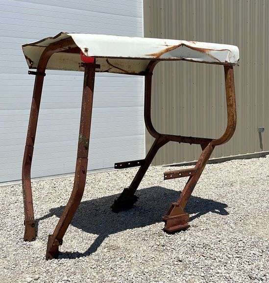 Canopy & roll bar for 66 series IH tractor - Schneider Auctioneers LLC