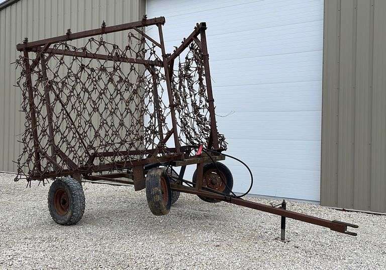 26' folding pasture harrow - Schneider Auctioneers LLC