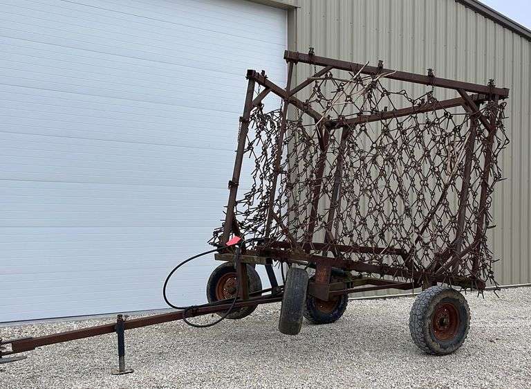 26' folding pasture harrow - Schneider Auctioneers LLC