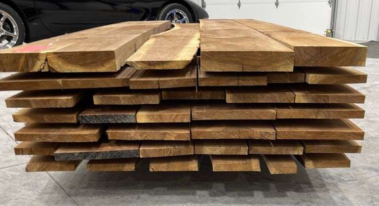 Group of rough sawn walnut lumber - Schneider Auctioneers LLC