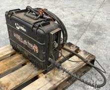 Miller Suitcase X-Treme 12VS mig welder - Schneider Auctioneers LLC
