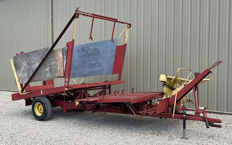 New Holland 1010 bale stack wagon - Schneider Auctioneers LLC