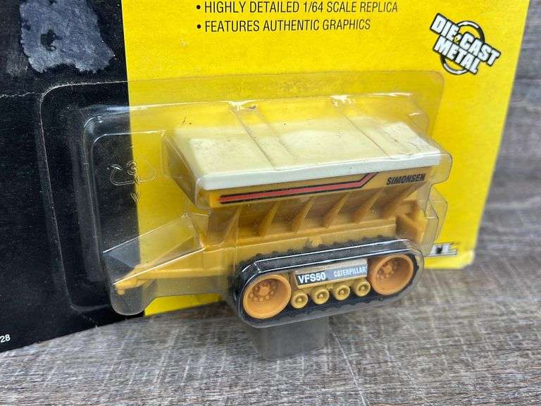 Pair of 1/64 Ertl Cat VFS50 implements - Schneider Auctioneers LLC