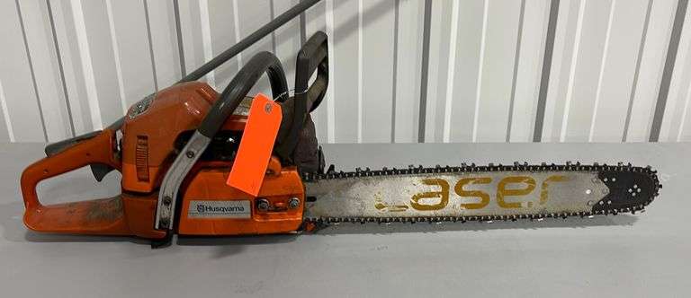 Husqvarna 357XP chainsaw - Schneider Auctioneers LLC