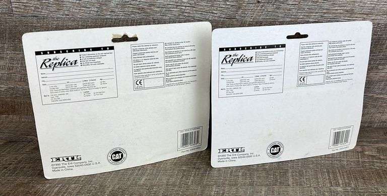 Pair of 1/64 Ertl Cat VFS50 implements - Schneider Auctioneers LLC