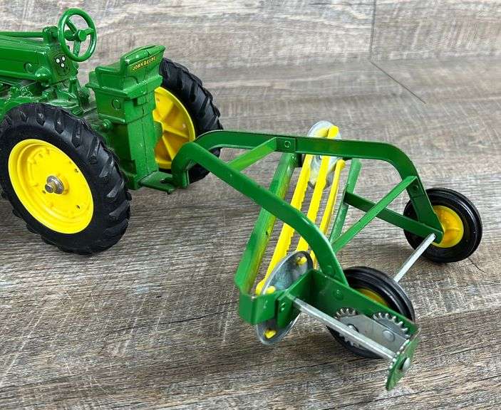 John Deere & Farmall 1/16 tractors & rake - Schneider Auctioneers LLC