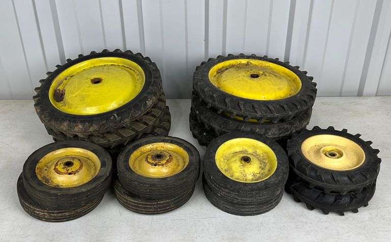 Group of used pedal tractor wheels - Schneider Auctioneers LLC