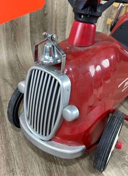 Radio Flyer metal ride on fire truck - Schneider Auctioneers LLC