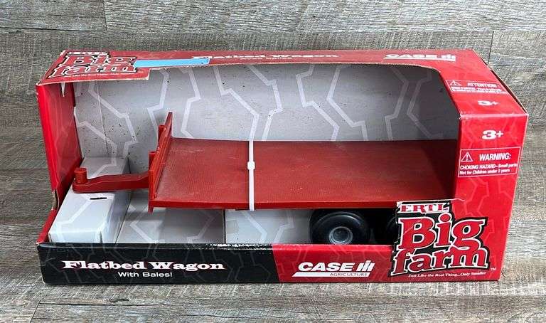 Ertl BigFarm Case IH flatbed wagon - Schneider Auctioneers LLC