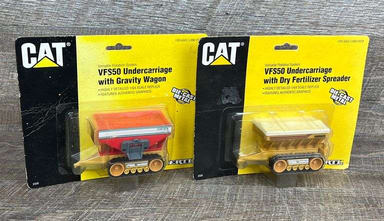 Pair of 1/64 Ertl Cat VFS50 implements - Schneider Auctioneers LLC